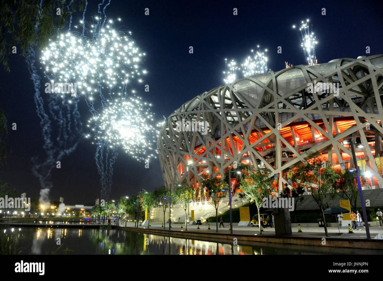 BEIJING, China - Fireworks explode over the National Stadium in Beijing ...