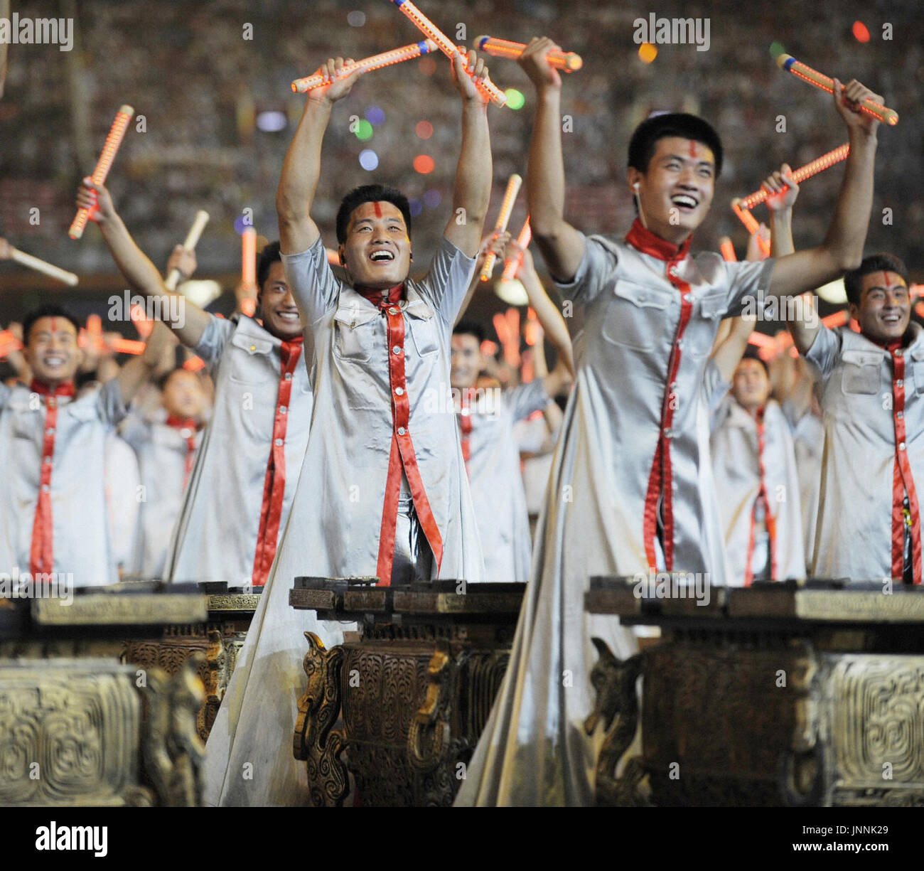 BEIJING, China - Drummers beat their instruments during the opening ...