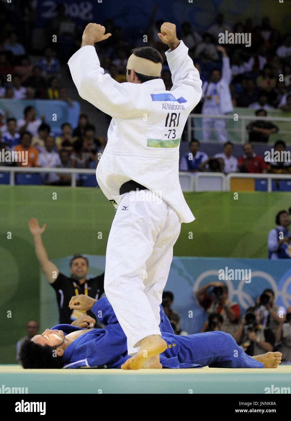 BEIJING, China - Ali Malomat of Iran celebrates after beating Japan's ...