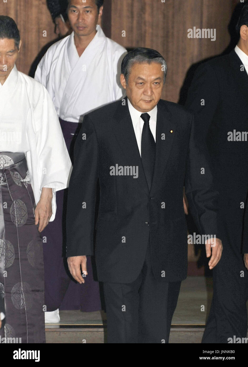 TOKYO, Japan - Agriculture minister Seiichi Ota (3rd R) emerges from ...