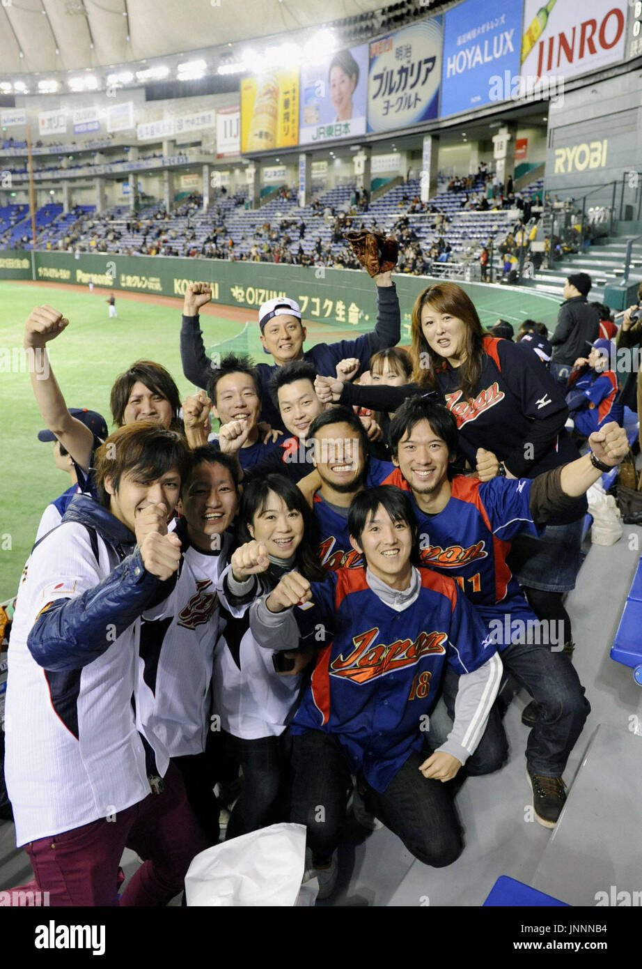 TOKYO, Japan - Japanese baseball fans pose for a photo at Tokyo Dome in ...