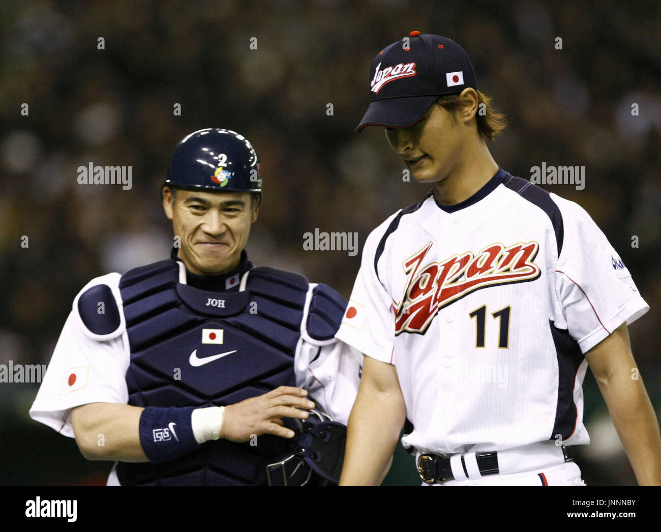 TOKYO, Japan - Japan catcher Kenji Jojima (L) talks with starting ...