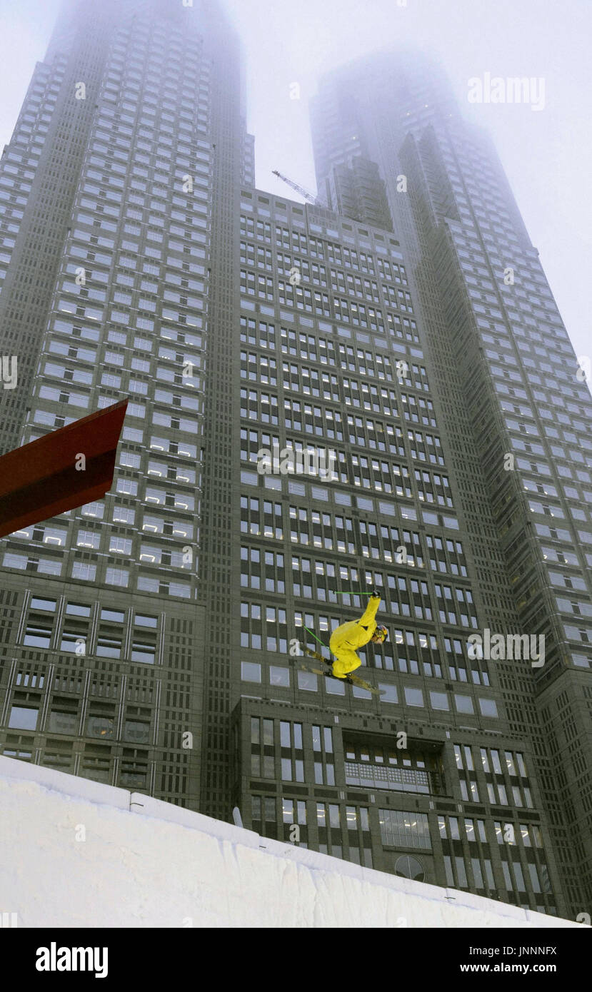 TOKYO, Japan - A freestyle skier leaps into the air from a 15-meter ...