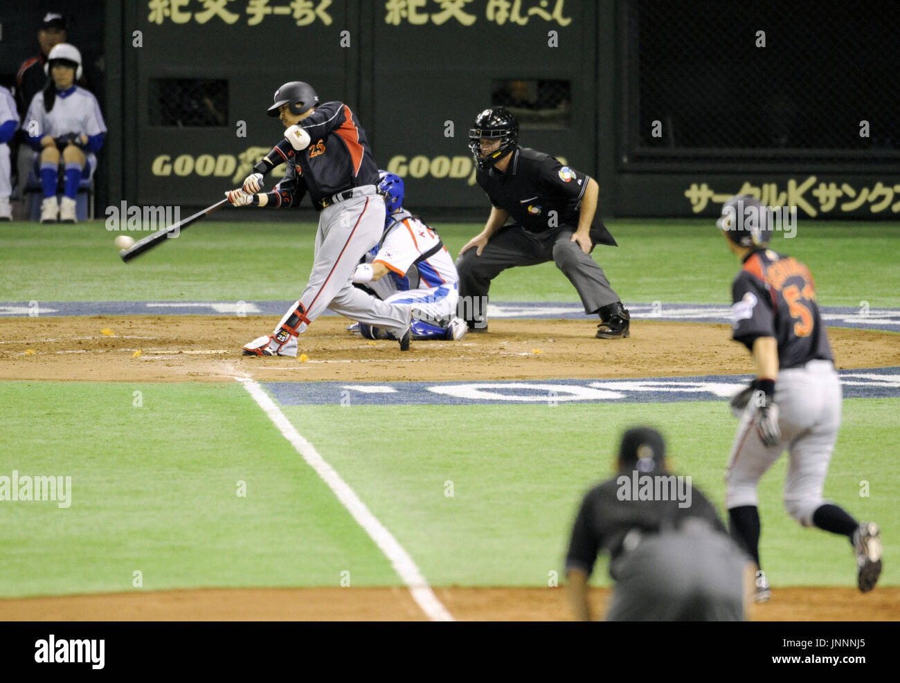 TOKYO, Japan - Japan's third baseman Shuichi Murata hits a three-run ...