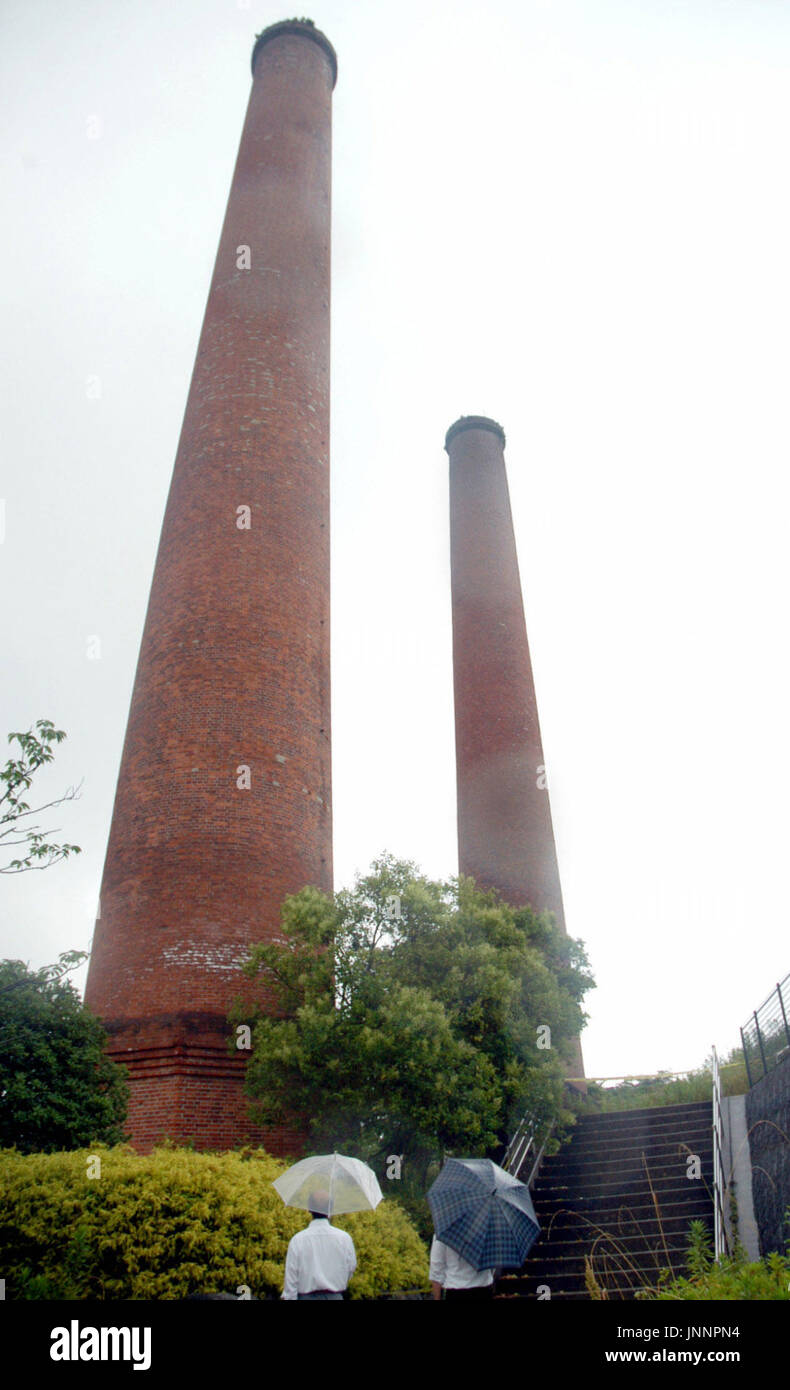 FUKUOKA, Japan - This pair of brick chimneys at the Ida coalmine ...
