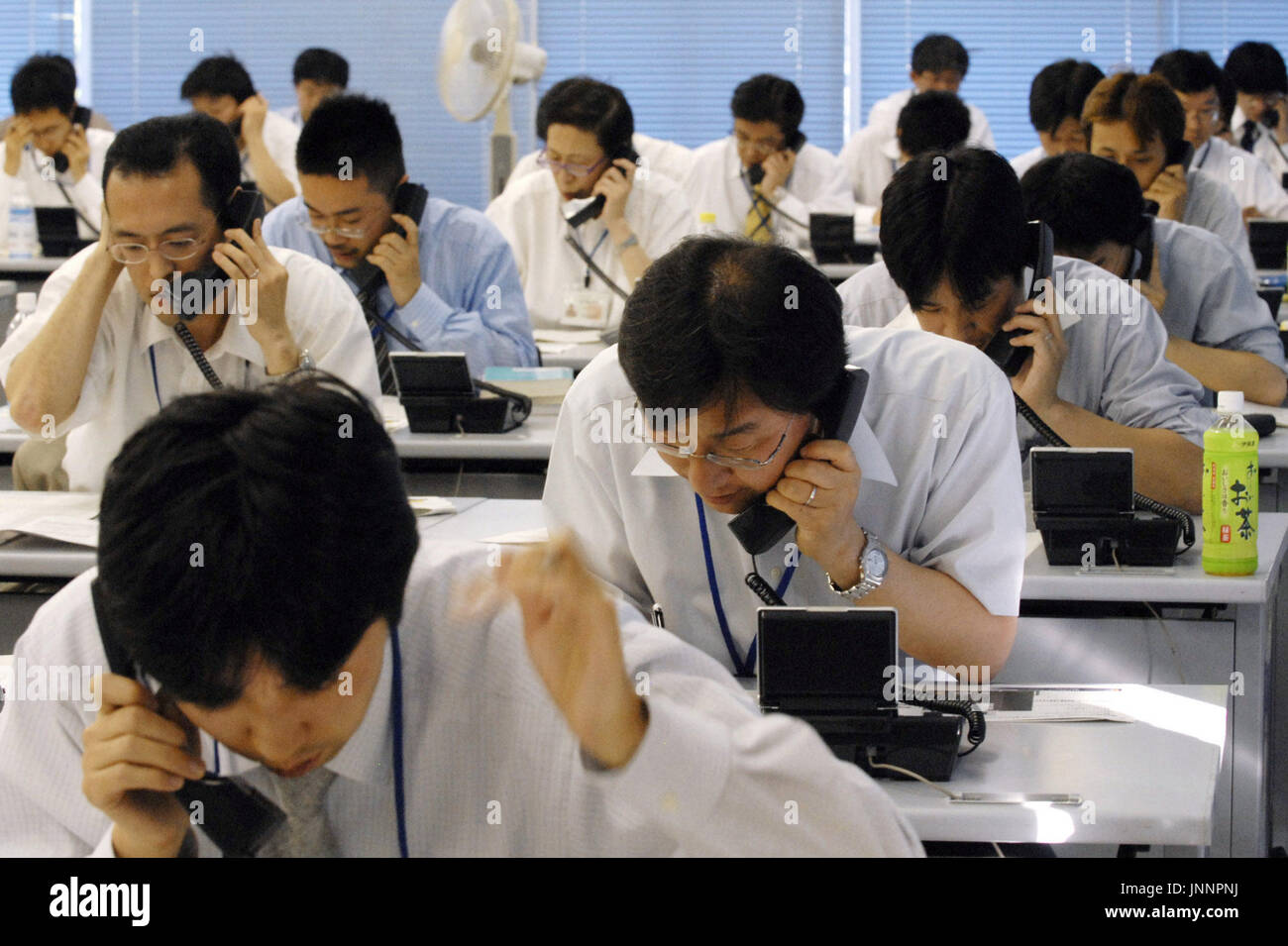 TOKYO, Japan - Social Insurance Agency staffers reply to pension ...