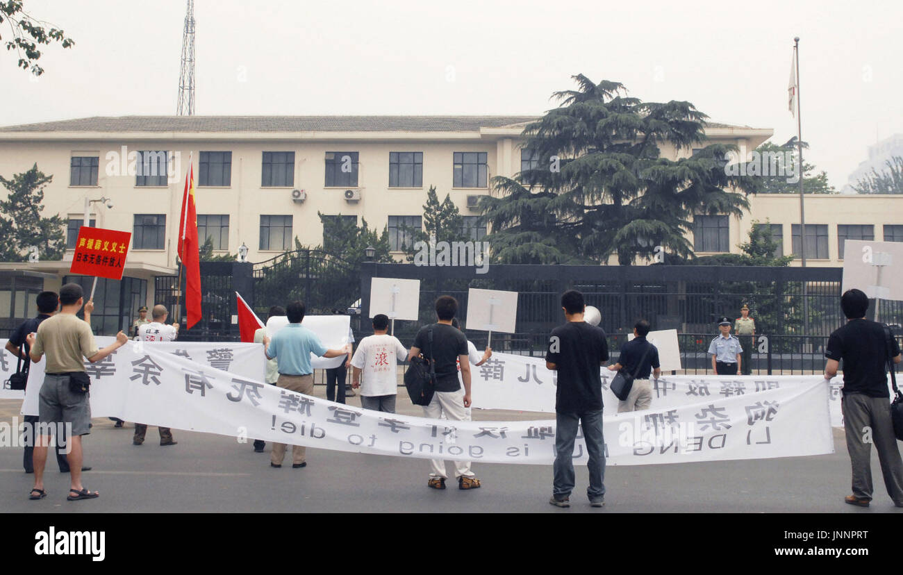 BEIJING, China - Chinese activists holds banners outside the Japanese ...