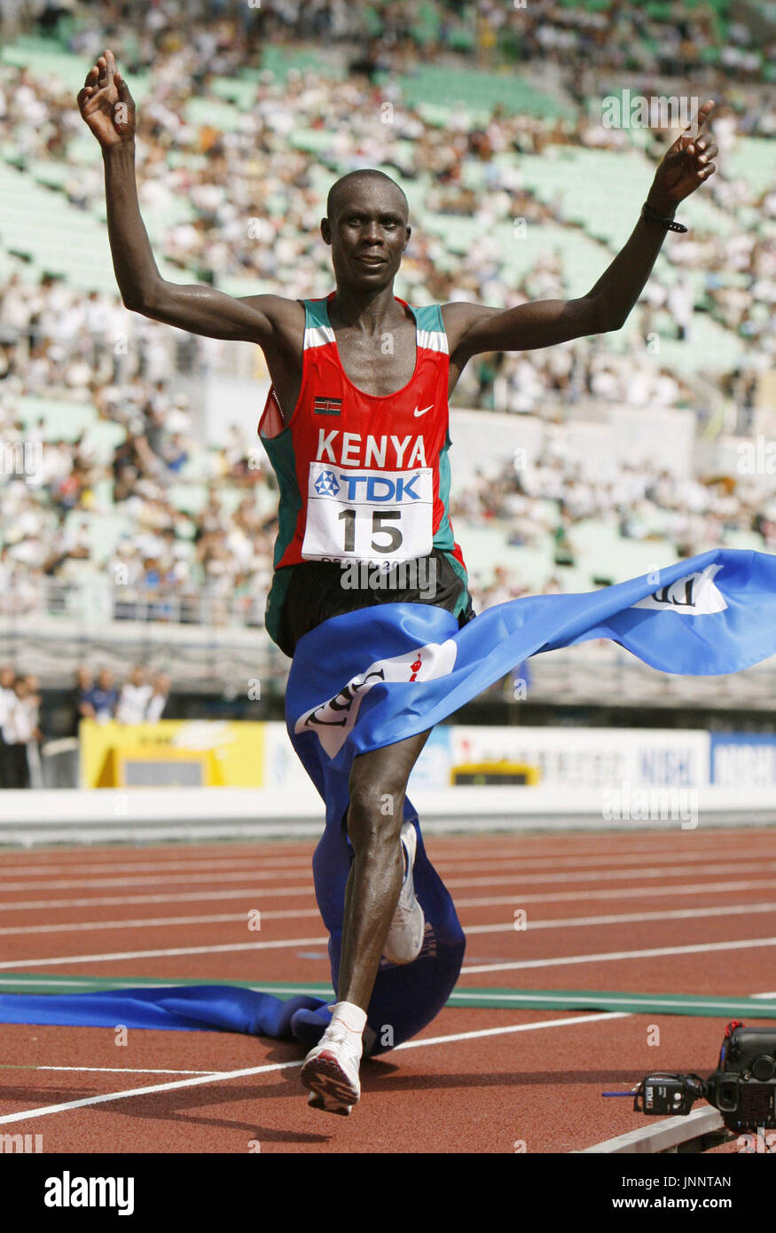 OSAKA, Japan - Kenya's Luke Kibet crosses the finish line to win the ...