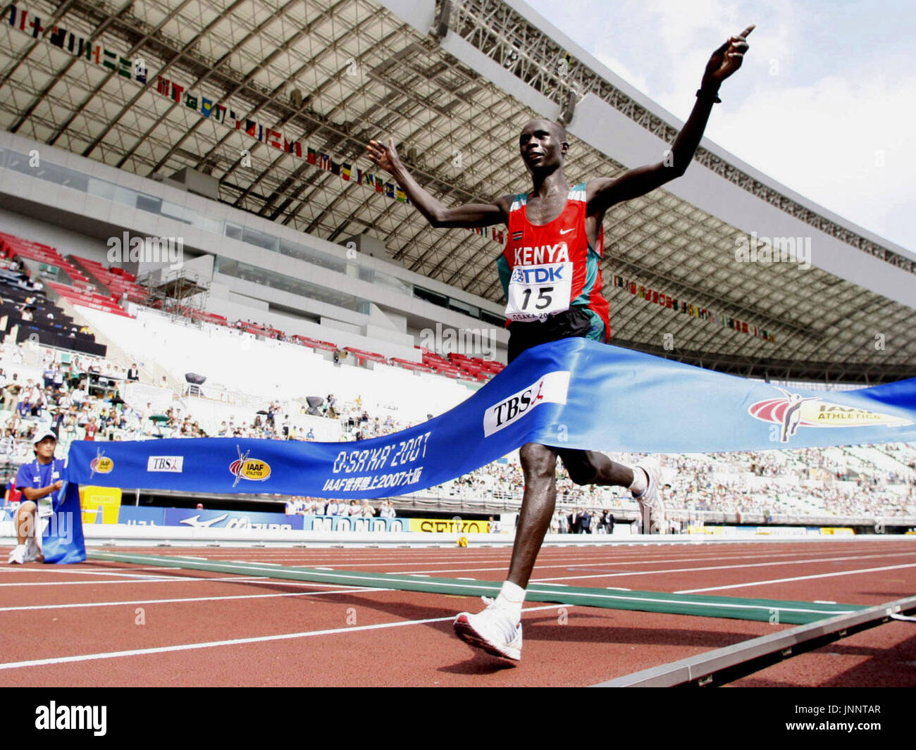 OSAKA, Japan - Kenya's Luke Kibet crosses the finish line to win the ...