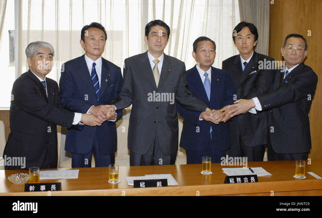 TOKYO, Japan - Prime Minister Shinzo Abe (C) poses with five newly ...