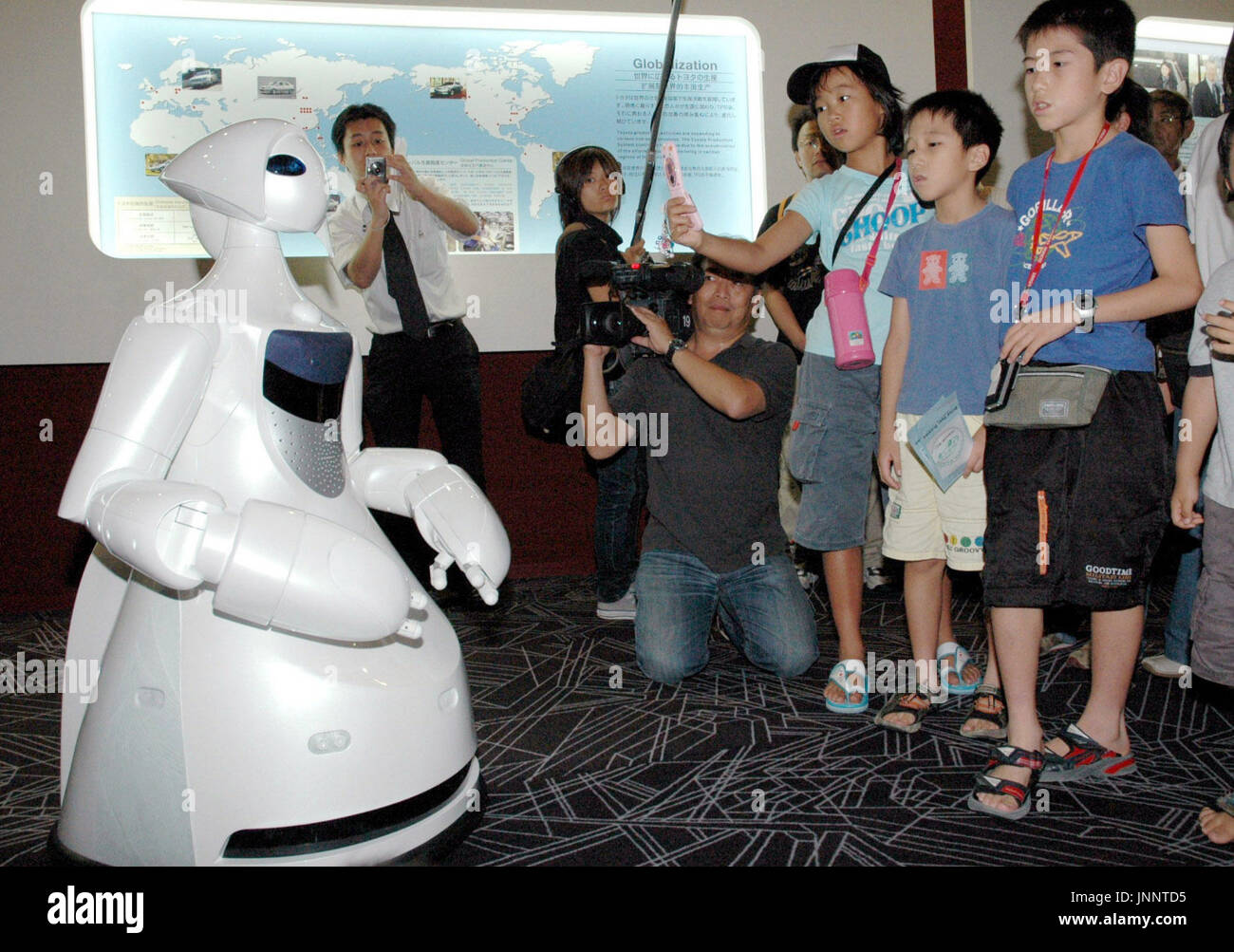NAGOYA, Japan - A robot, developed by Toyota Motor Corp., begins ...