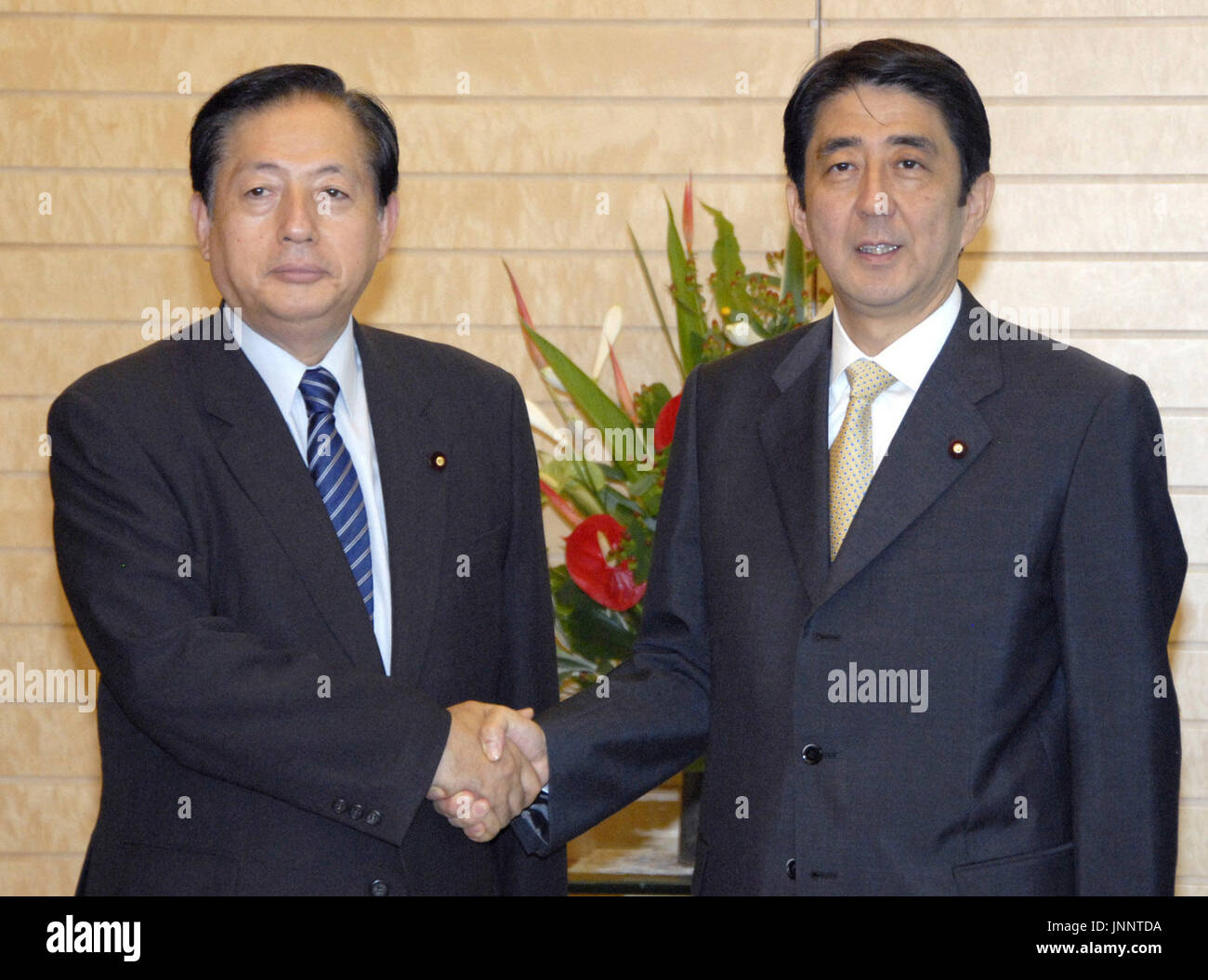 TOKYO, Japan - Prime Minister Shinzo Abe (R) and New Komeito leader ...