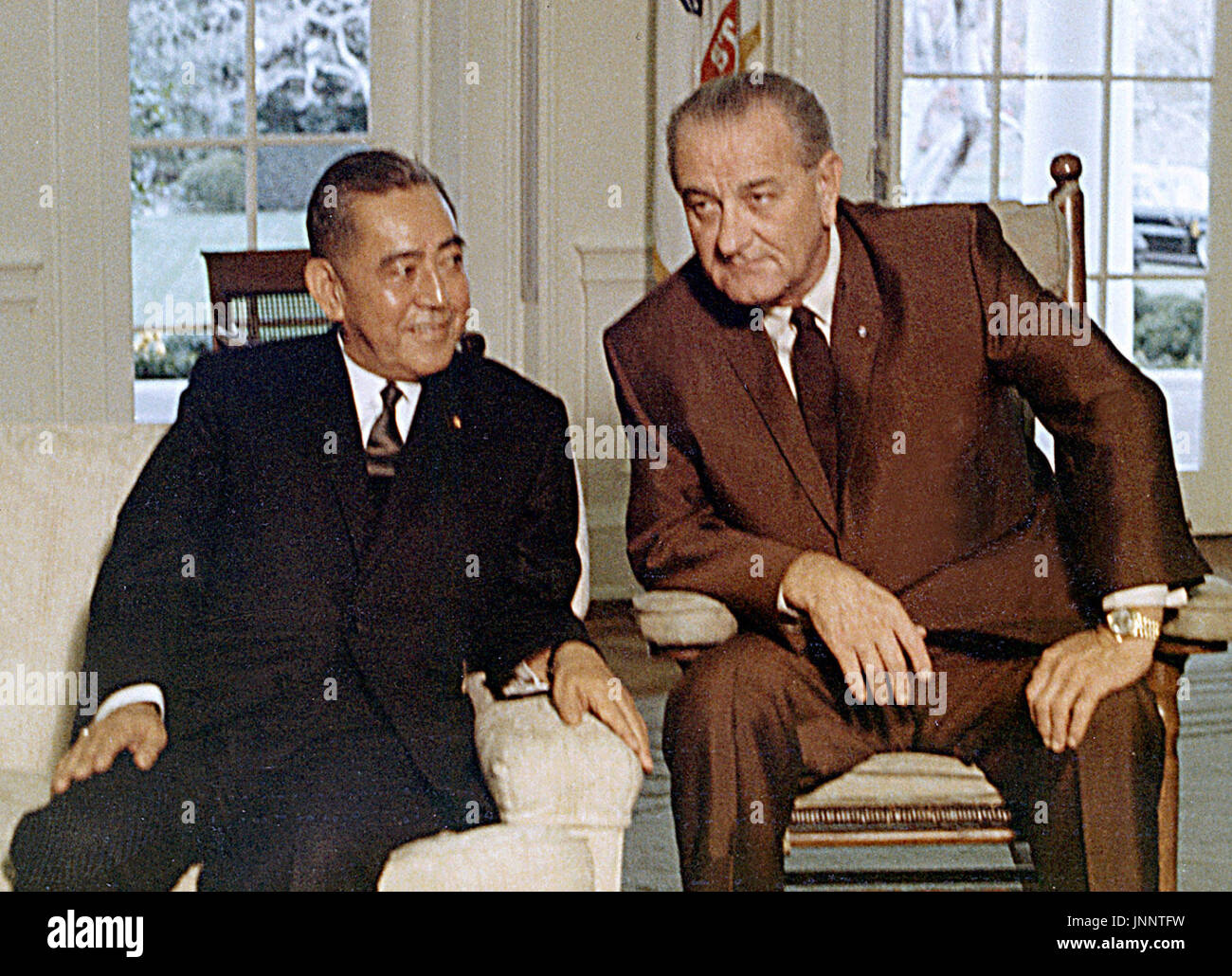 TOKYO, Japan - Japanese Prime Minister Eisaku Sato (L) is in talks with ...
