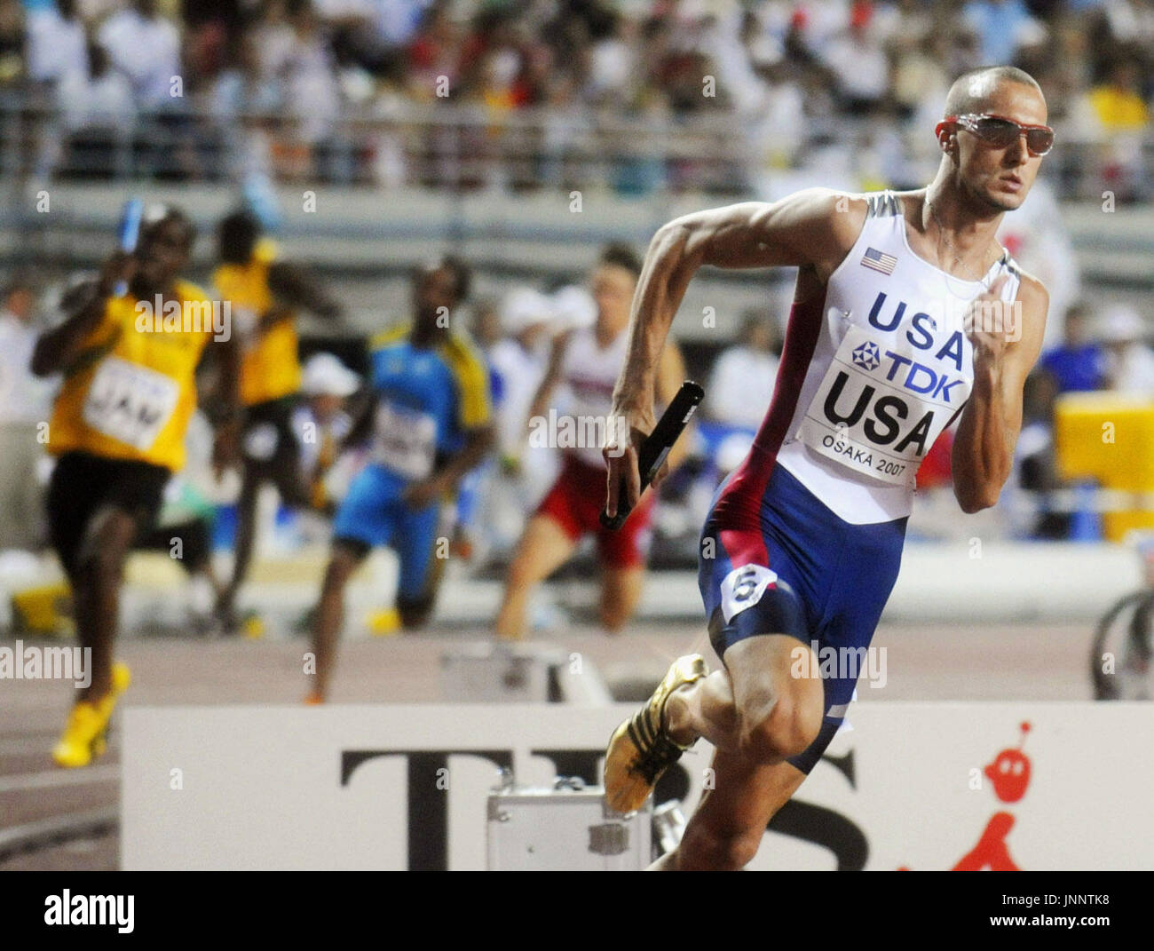 Osaka, Japan - Jeremy Wariner of the United States (R) competes in the ...