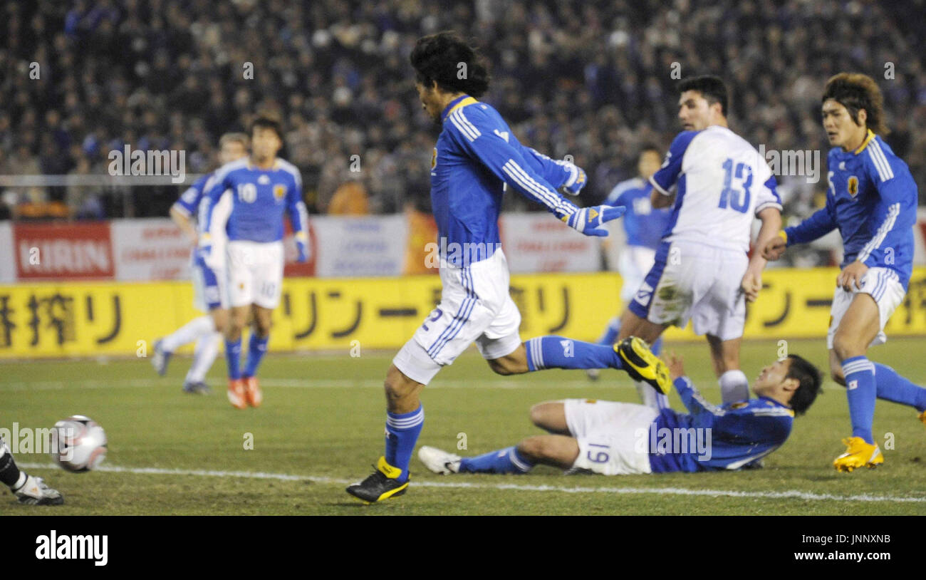 TOKYO, Japan - Japan defender Yuji Nakazawa (C) scores his side's first goal in the 68th minute ...