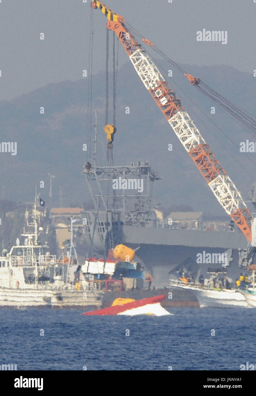 TATEYAMA, Japan - The two broken halves of the fishing boat Seitoku ...