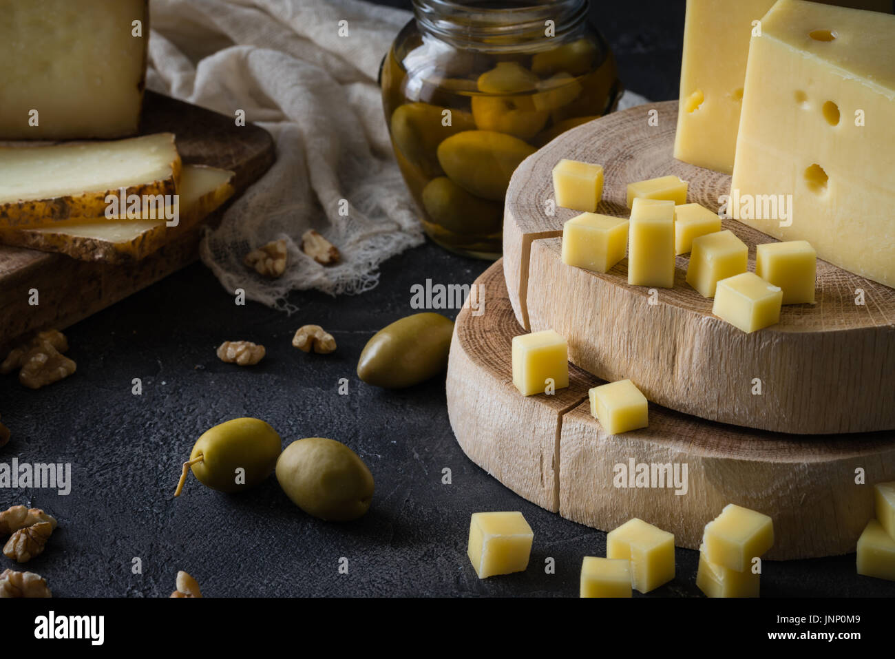 Cheese platter of chopped Swedish hard cheese and sliced and Italian ...
