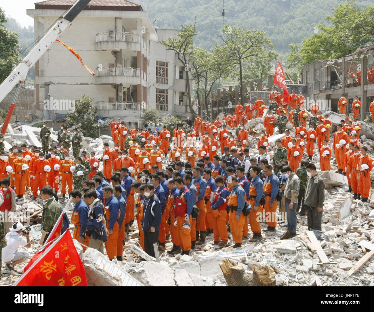 BEICHUAN, China - Japanese rescue team members (forefront) join other ...