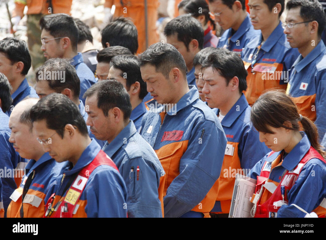 BEICHUAN, China - Japanese rescue team members (forefront) join other ...