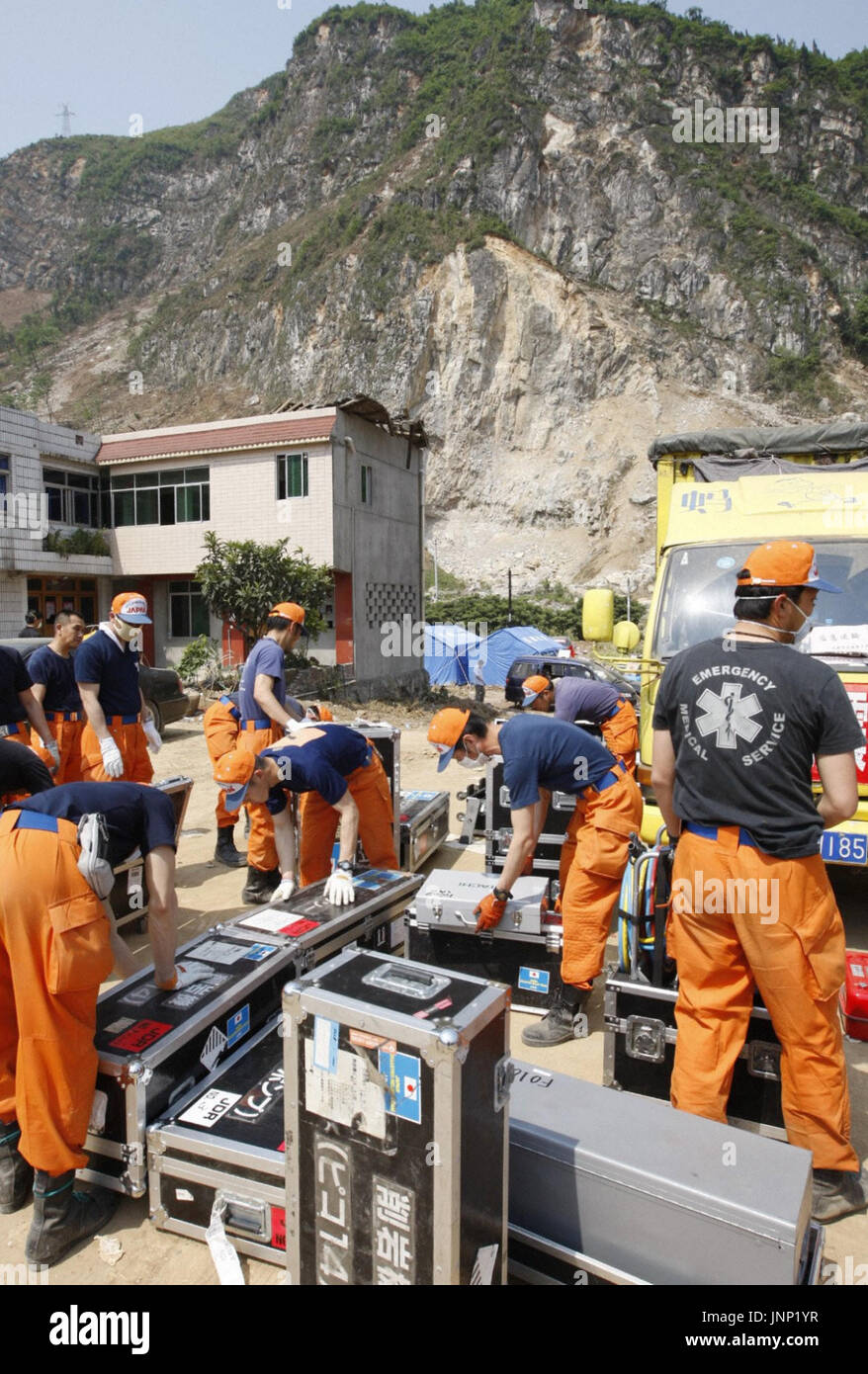 BEICHUAN, China - Japanese rescue workers pack up their equipment at ...