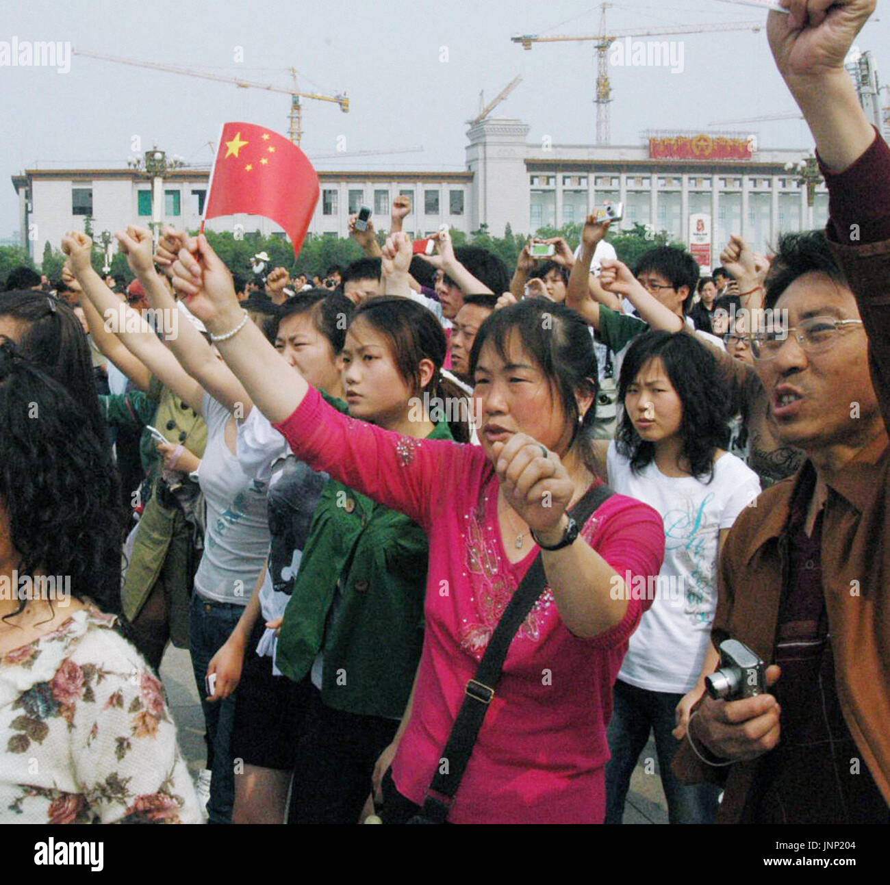 BEIJING, China - Shouting ''Long live China,'' Beijing residents march ...