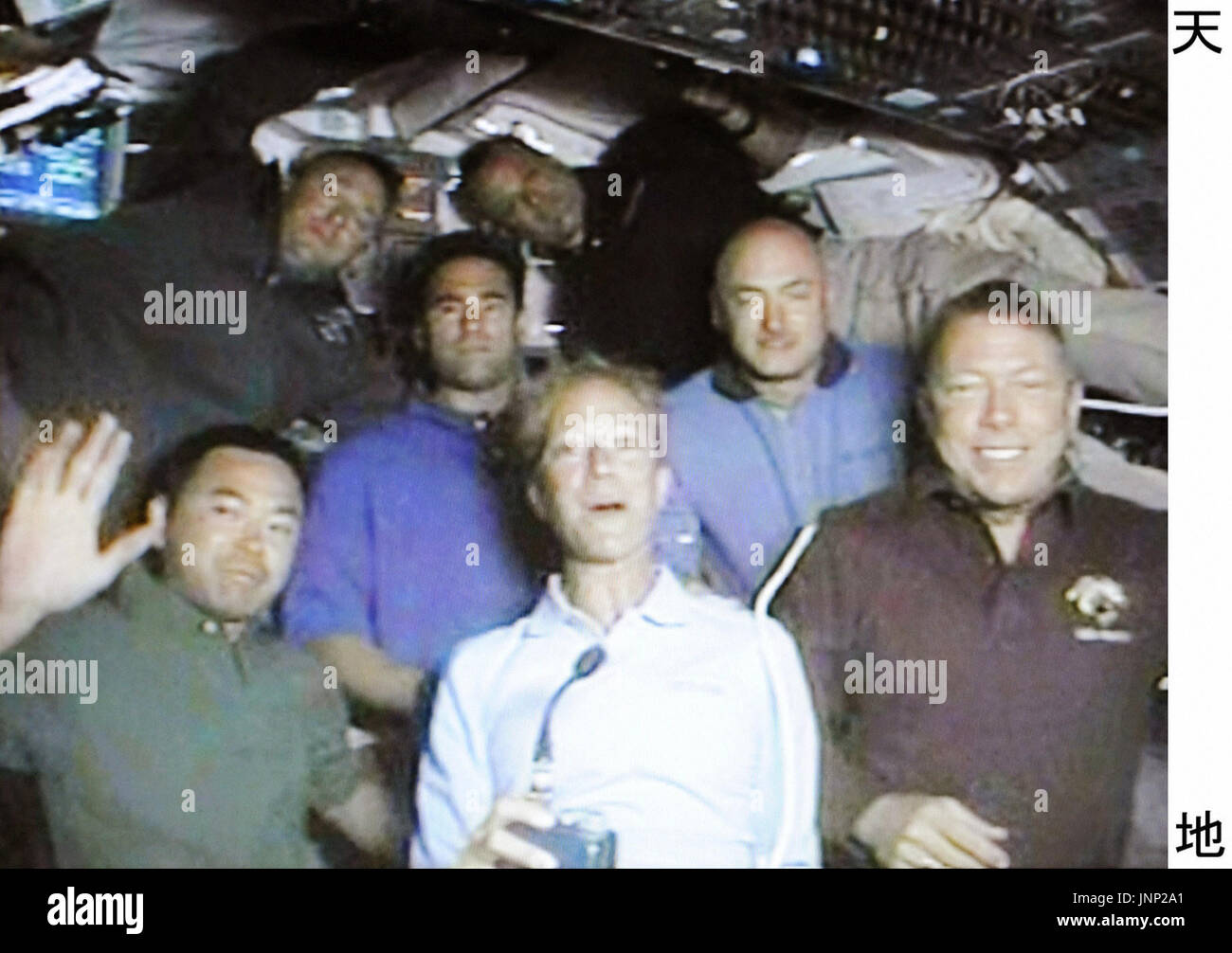 HOUSTON, United States - Japanese astronaut Akihiko Hoshide (L in front ...