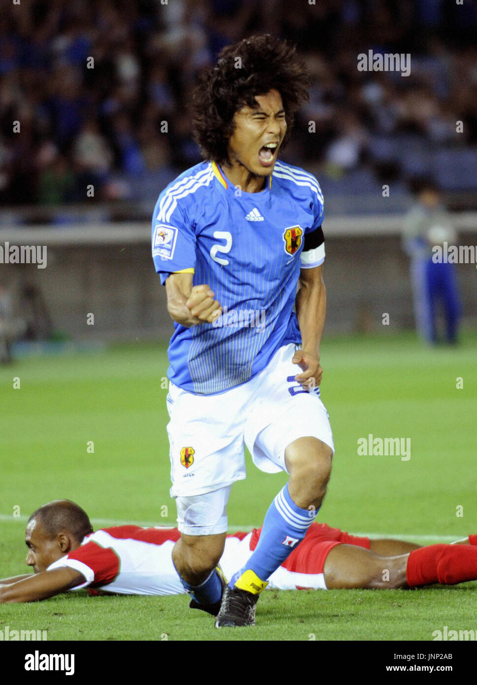 YOKOHAMA, Japan - Japan defender Yuji Nakazawa celebrates after scoring ...
