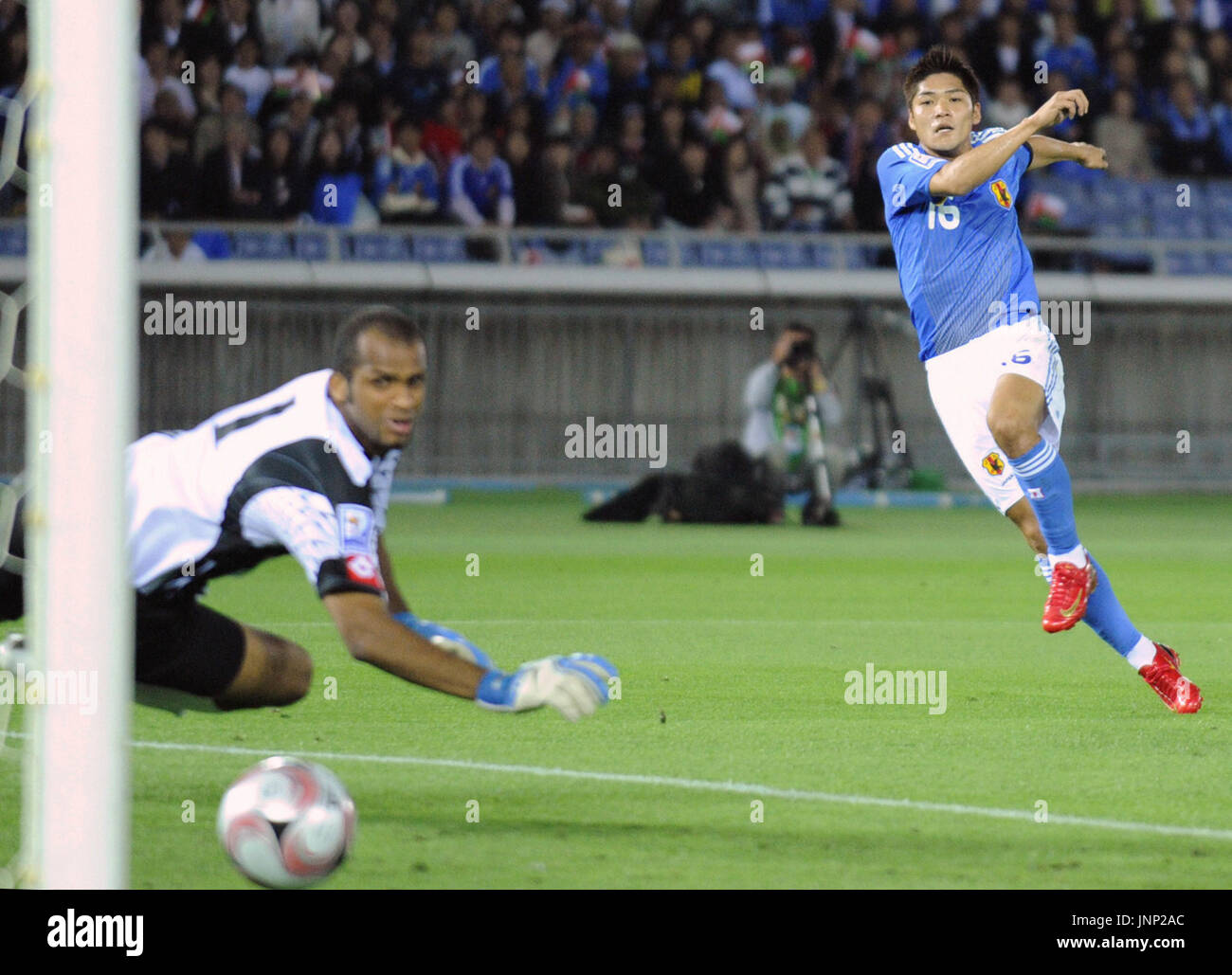 YOKOHAMA, Japan - Japan striker Yoshito Okubo scores the second goal in ...