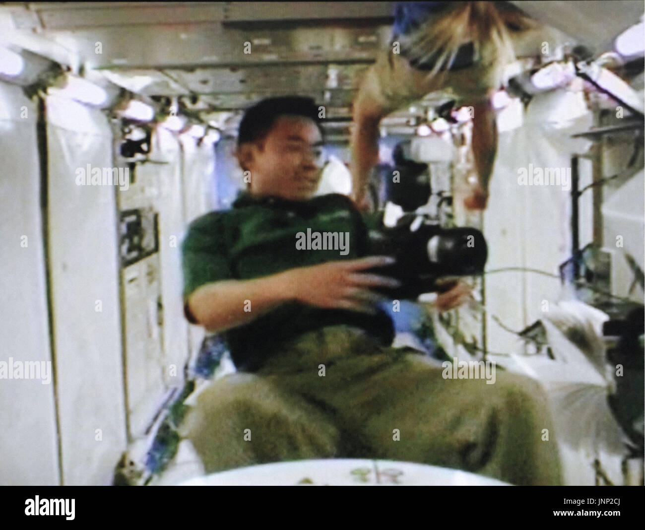 HOUSTON, United States - Japanese astronaut Akihiko Hoshide works in ...