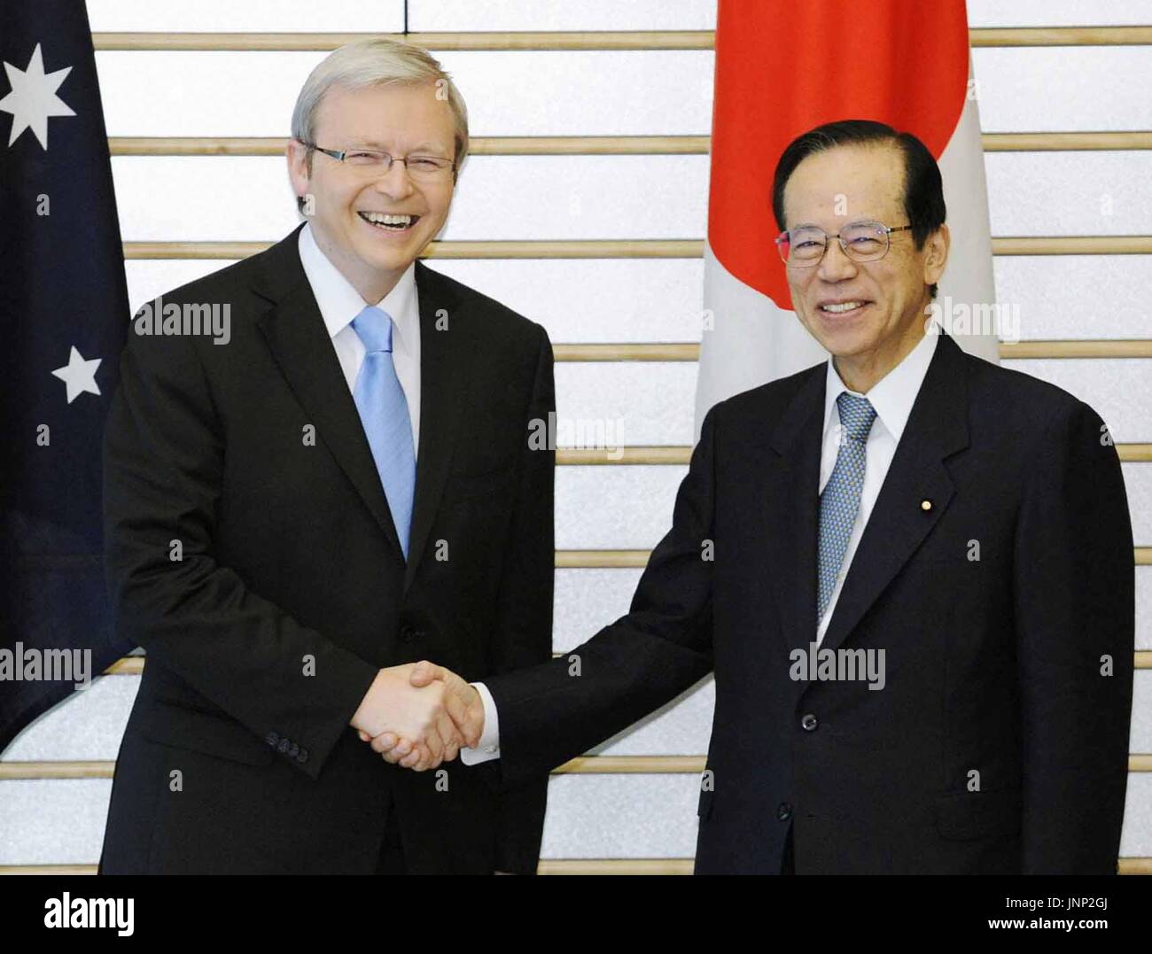 TOKYO, Japan - Japanese Prime Minister Yasuo Fukuda (R) shakes hands ...
