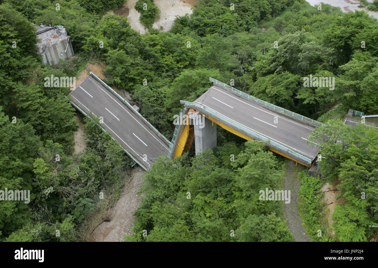 KITAKAMI, Japan - A road bridge on National Route 342 lies destroyed in ...