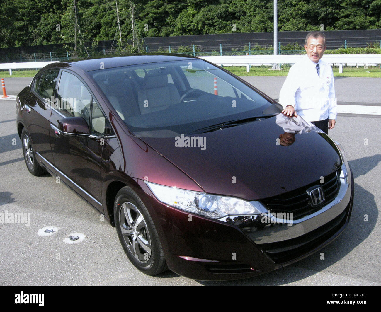 TOKYO, Japan - Honda Motor Co. President Takeo Fukui poses with the ...