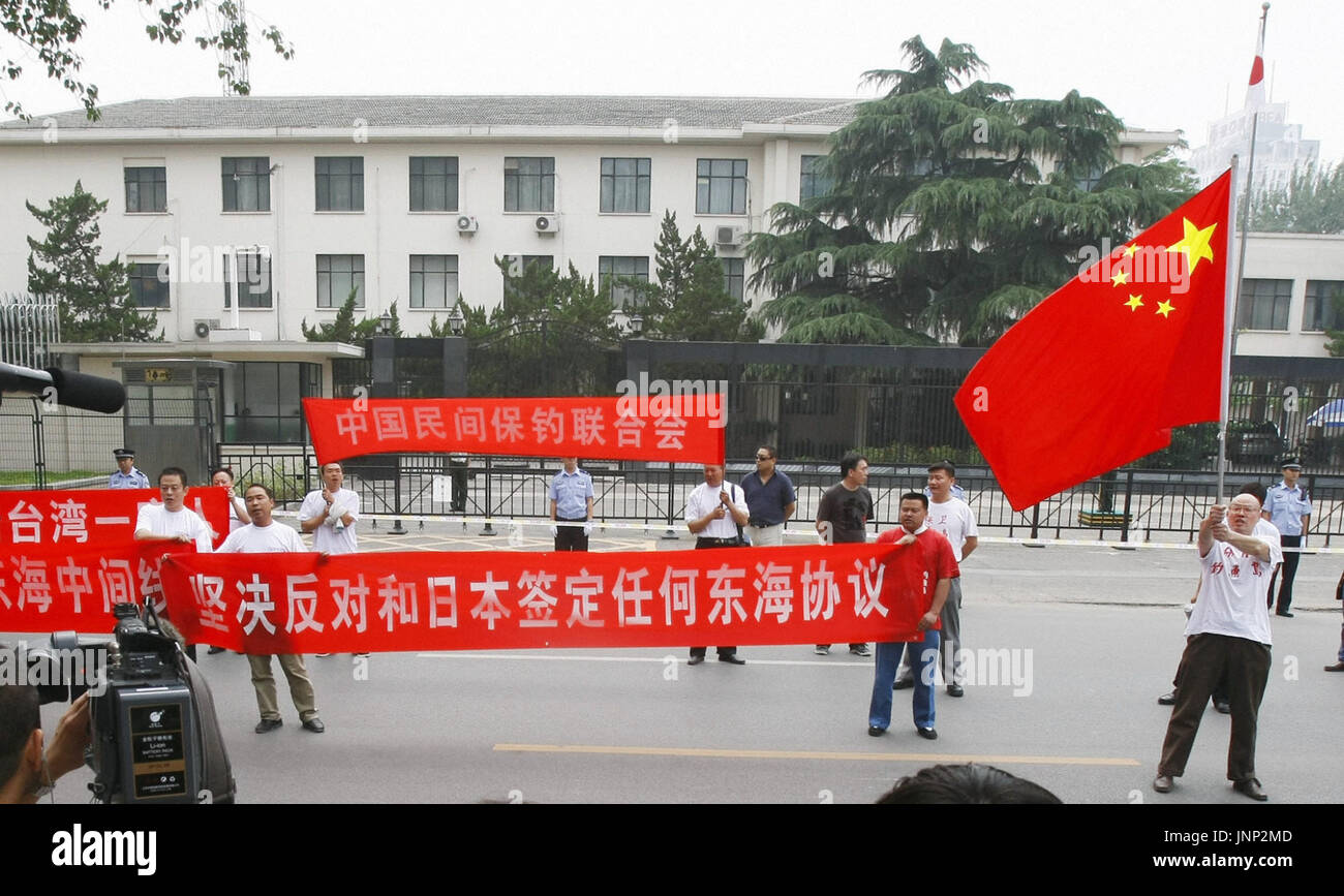 BEIJING, China - Chinese demonstrators hold banners and shout slogans ...
