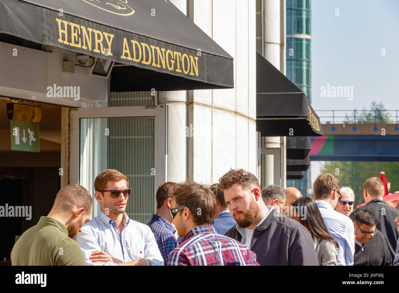 London, UK - May 10, 2017 - Dockside bar in Canary Wharf packed with ...