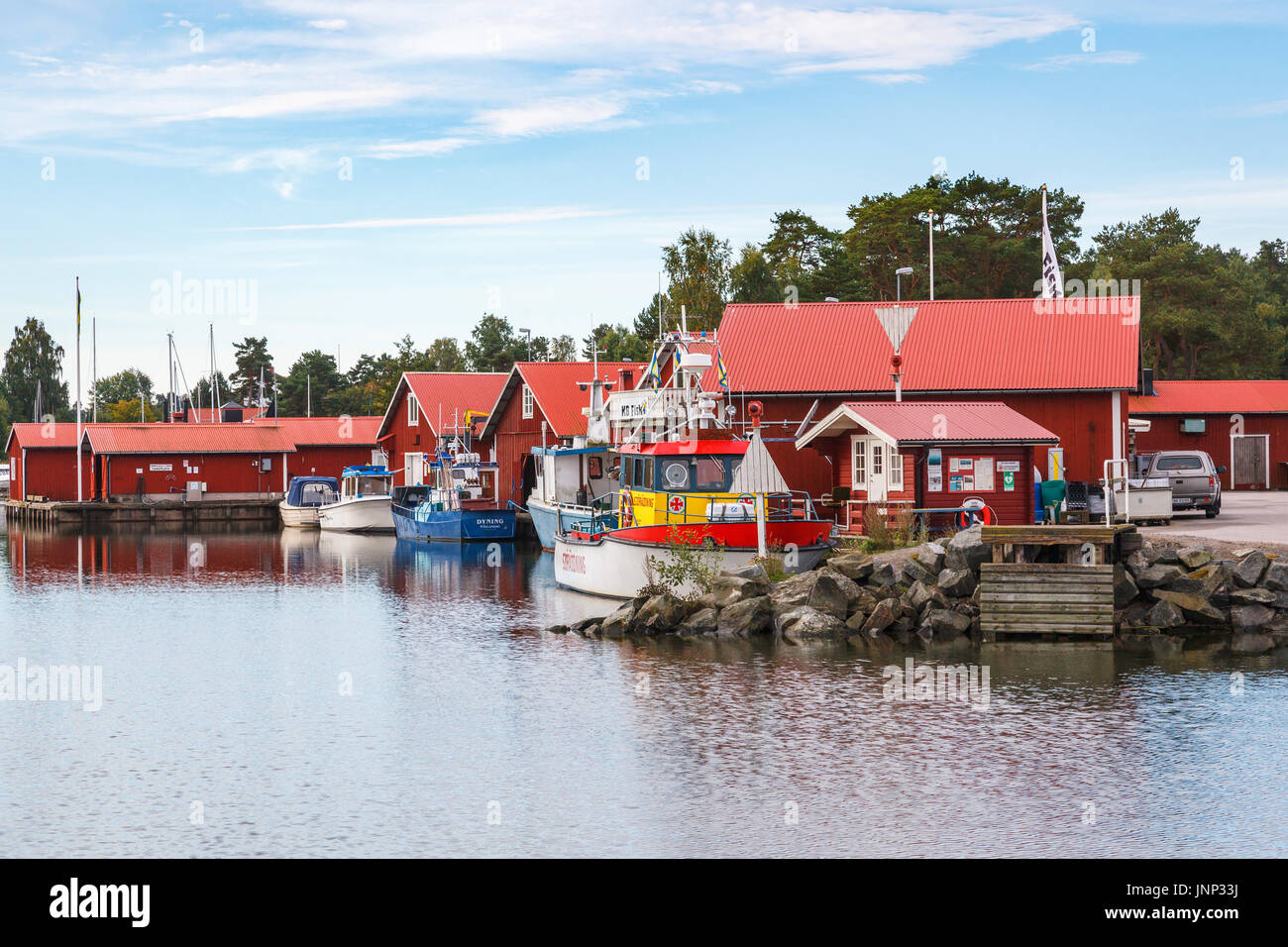 Spiken Fishing village, with a rescue boat at Lake Vanern in Sweden ...