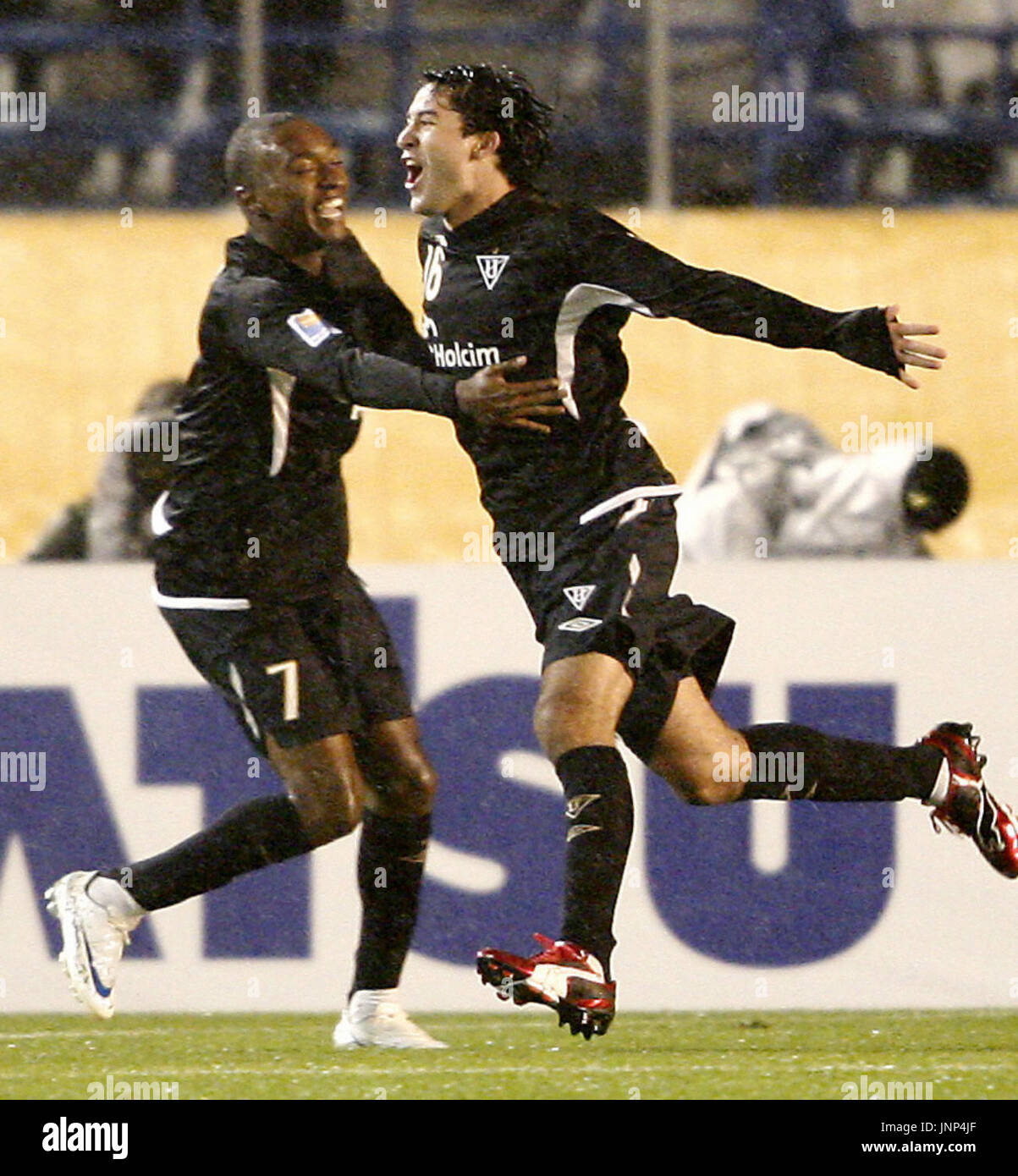 TOKYO, Japan - Ecuador's Liga de Quito striker Claudio Bieler (R) and ...