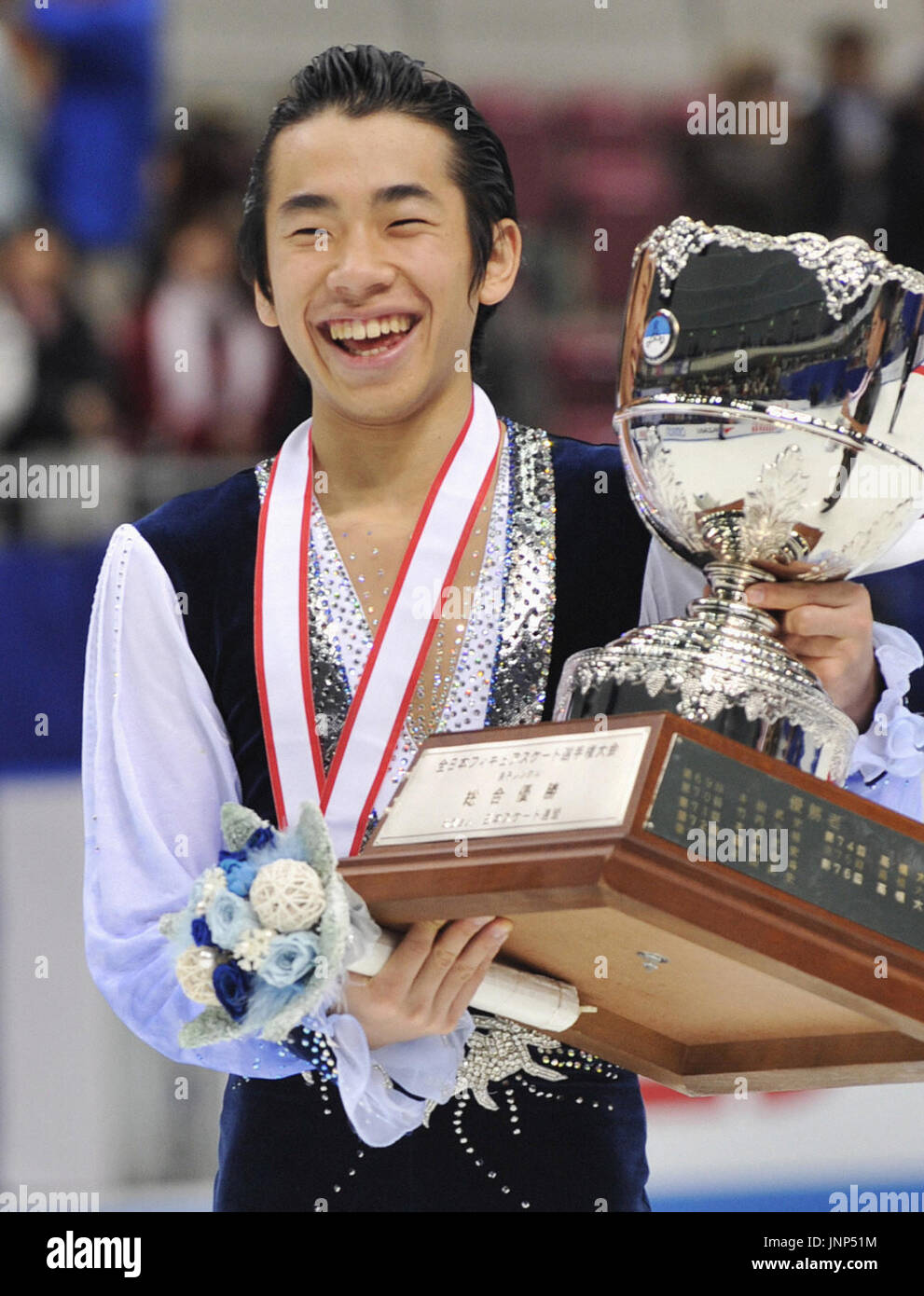 NAGANO, Japan - Nobunari Oda smiles with the trophy in his hands at Big ...