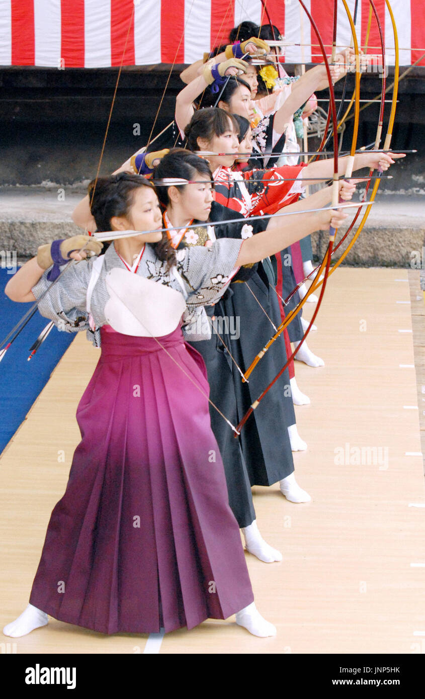 KYOTO, Japan - Young female archers dressed in traditional kimono and ...