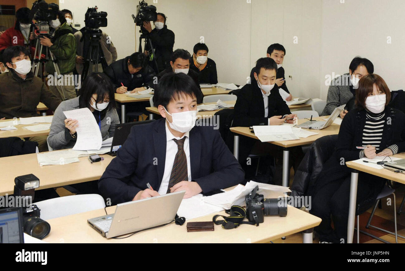 TOKYO, Japan - Reporters covering the flu outbreak at Tsurukawa ...