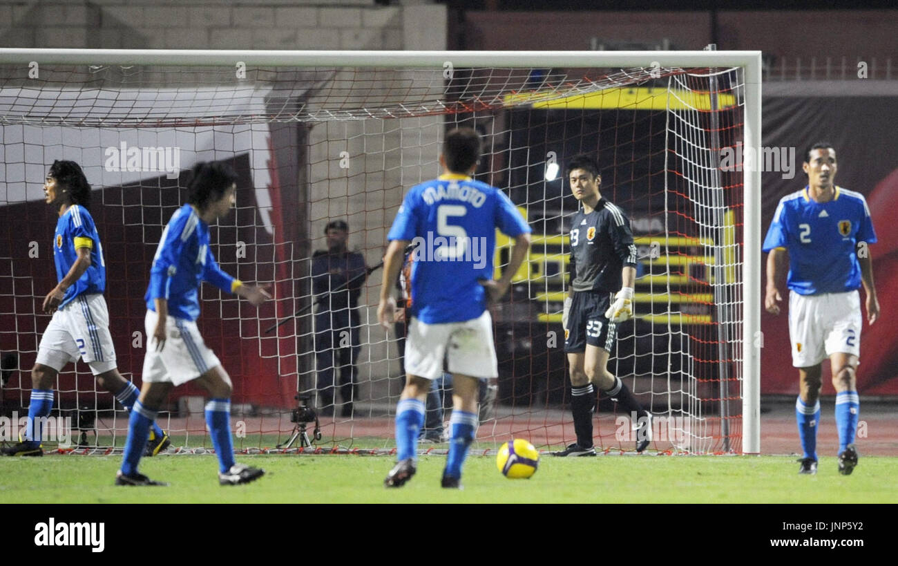 MANAMA, Bahrain - Japan's goalkeeper Eiji Kawashima (2nd from R) and ...