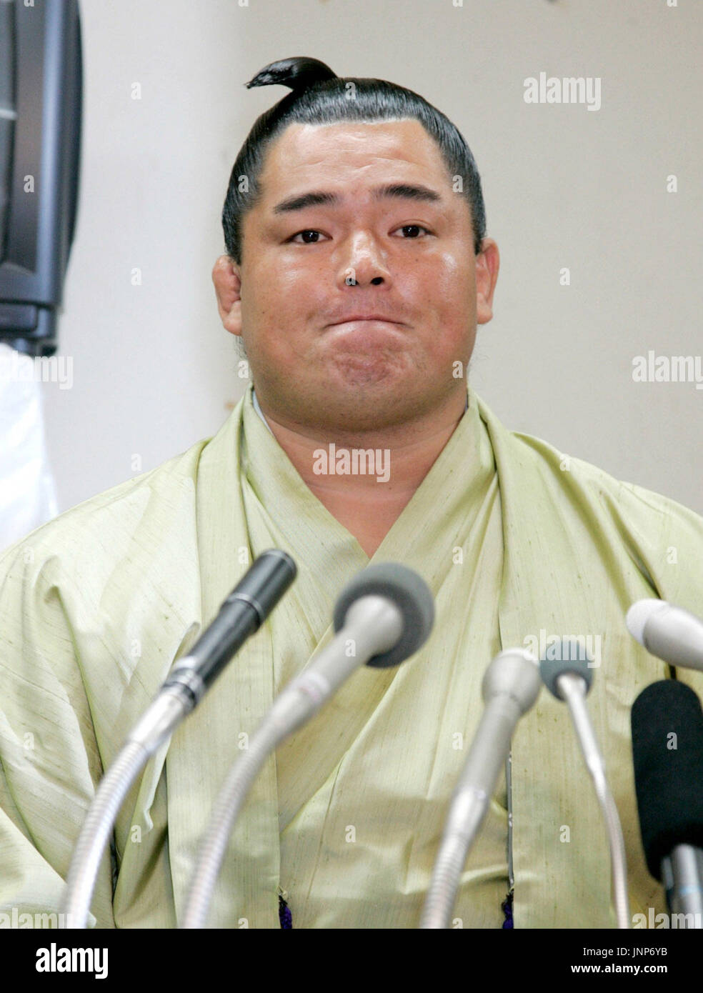 TOKYO, Japan - Makuuchi division wrestler Tokitsuumi meets the press in ...