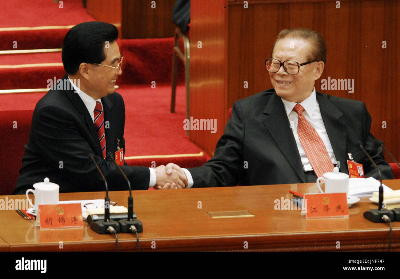 BEIJING, China - Chinese President Hu Jintao (L) shakes hands with his ...