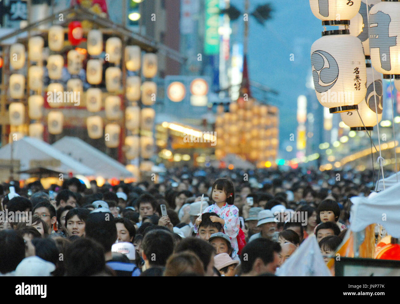 KYOTO, Japan - People walk in Kyoto on July 16 on the eve of the ...