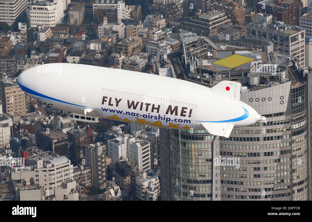 TOKYO, Japan - A Zeppelin NT, the world's largest airship, cruises over ...