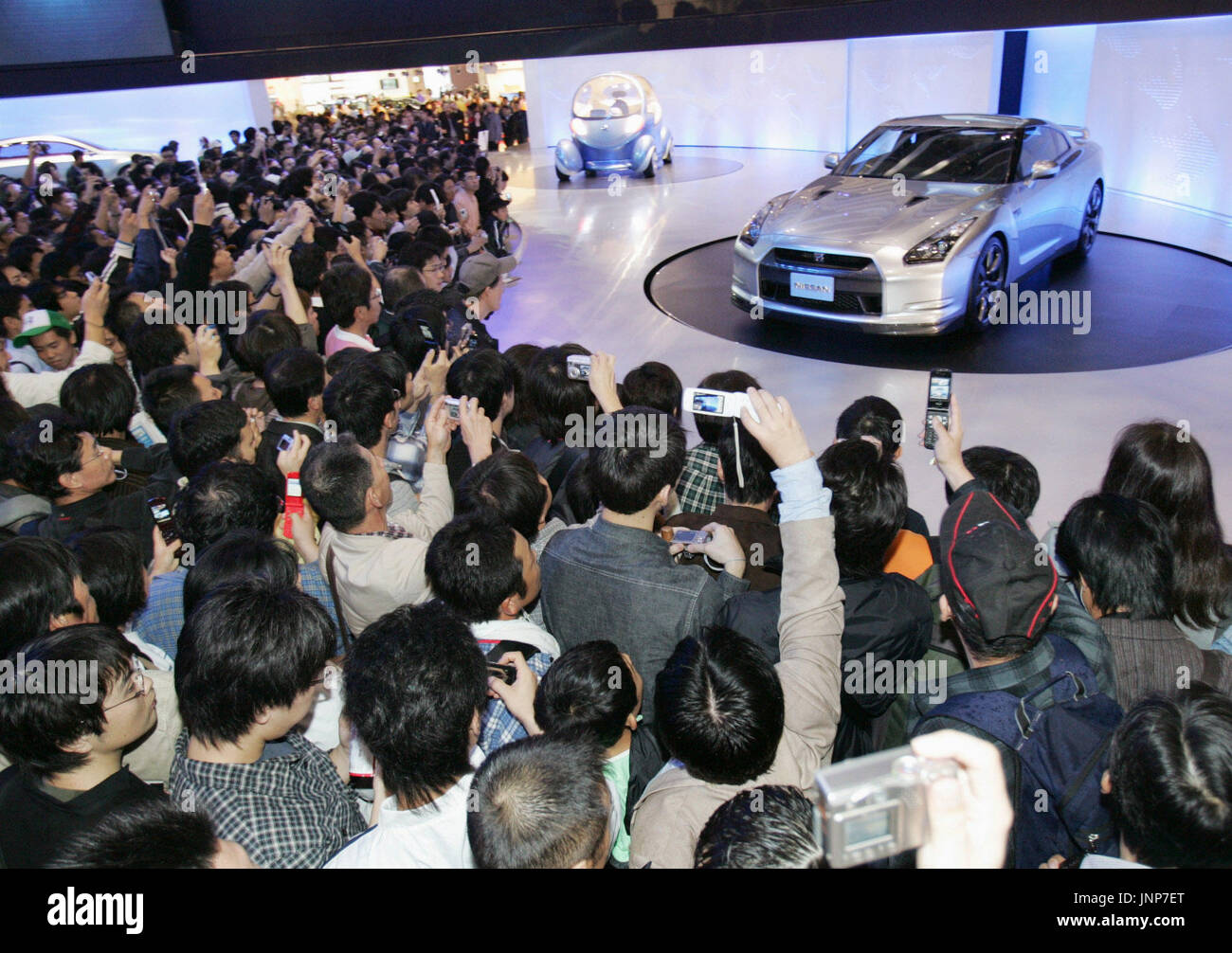 CHIBA, Japan - Car fans marvel at new car models on display at the 40th ...