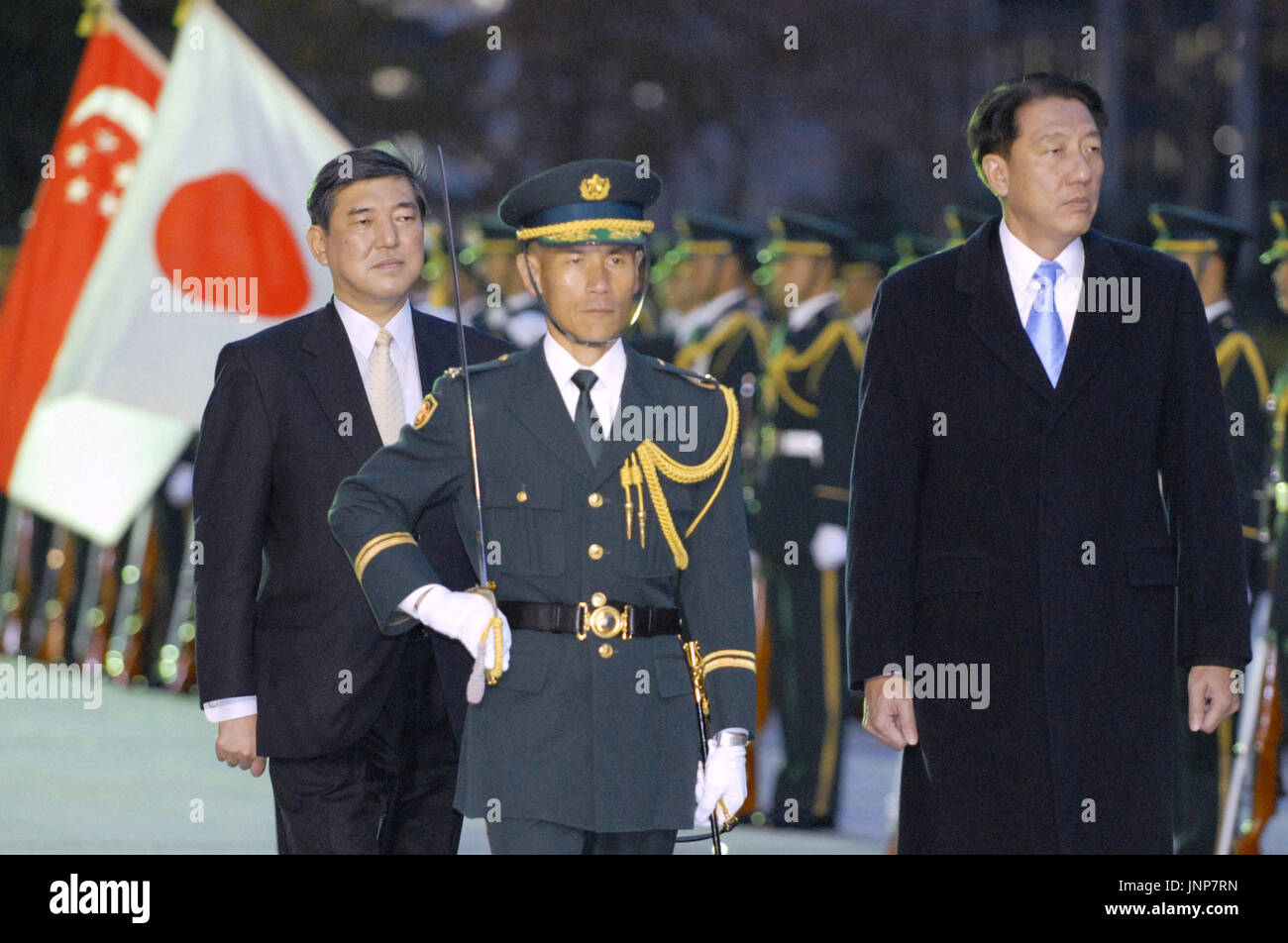 TOKYO, Japan - Singapore Defense Minister Teo Chee Hean (R) reviews a ...