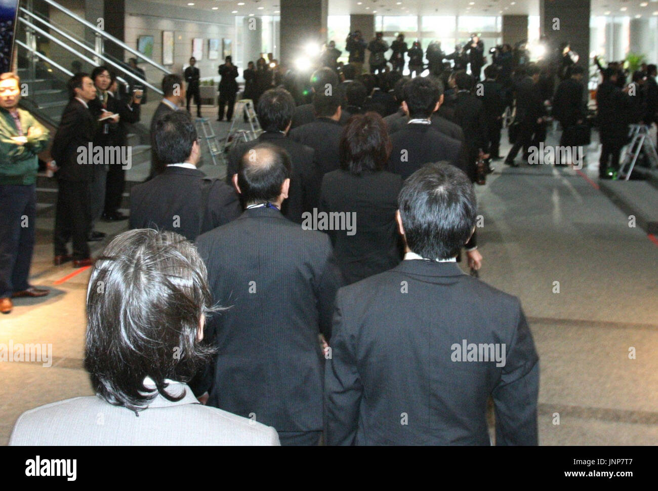TOKYO, Japan - About 100 public prosecutors walk into the headquarters ...