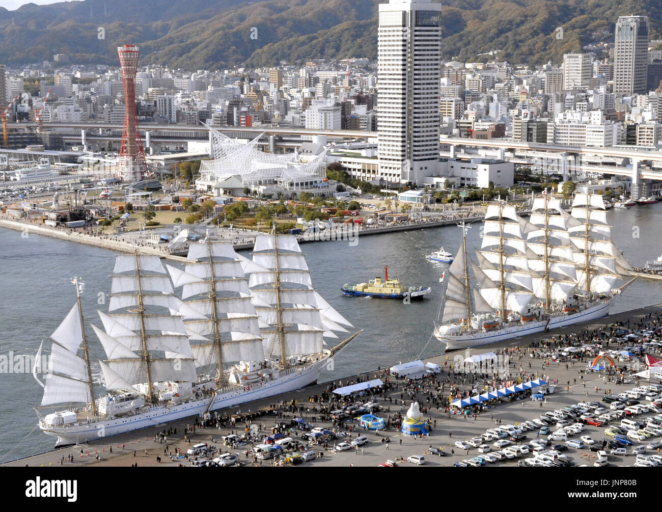 OSAKA, Japan - With sails fully extended, the tall ships Nippon Maru (R ...