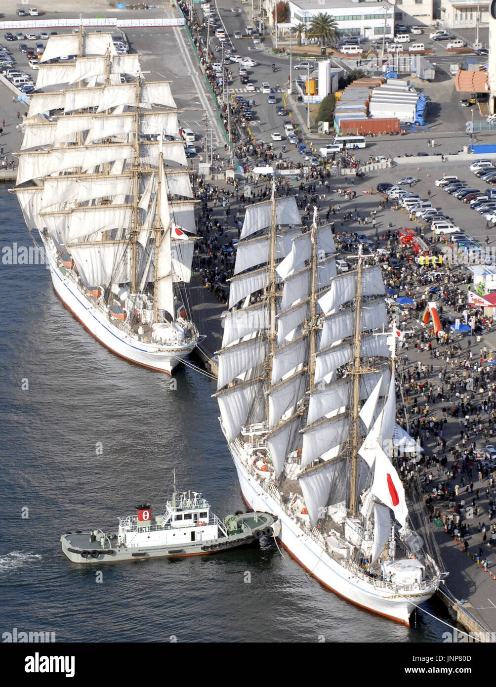 OSAKA, Japan - With sails fully extended, the tall ships Nippon Maru (L ...