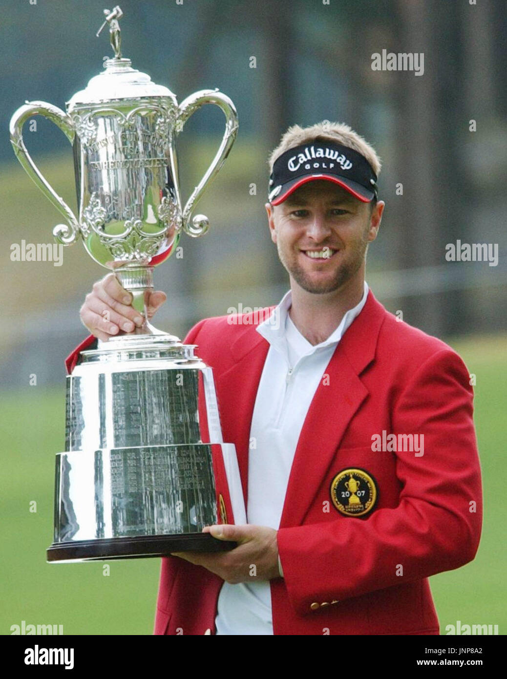 GOTEMBA, Japan - Brendan Jones of Australia holds the trophy after ...
